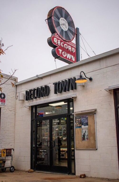 Record Town has a great groove and now its iconic sign is back – Record ...